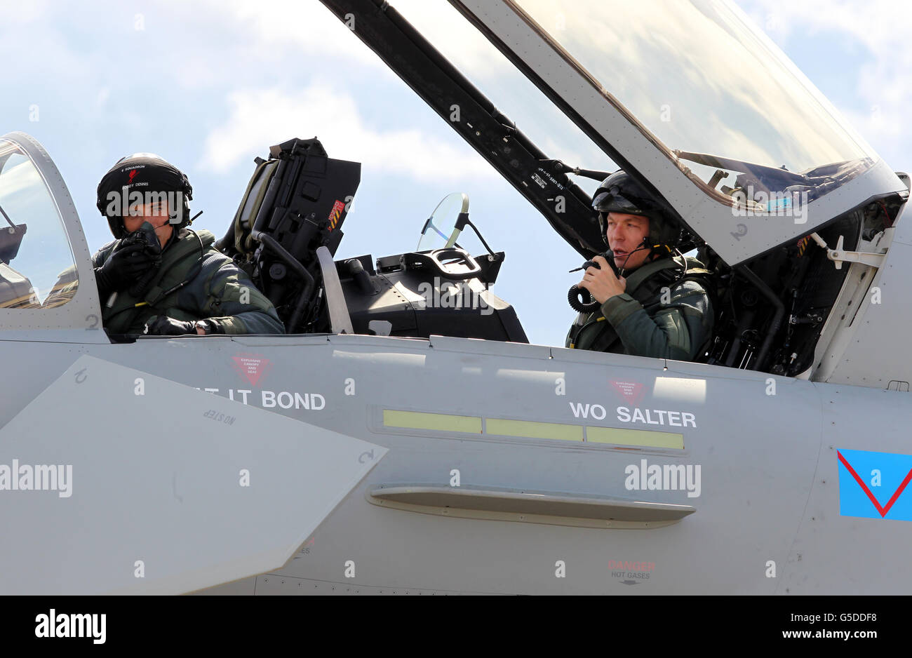 Sir Chris Hoy with pilot Wing Commander Roddy Dennis (left) after ...