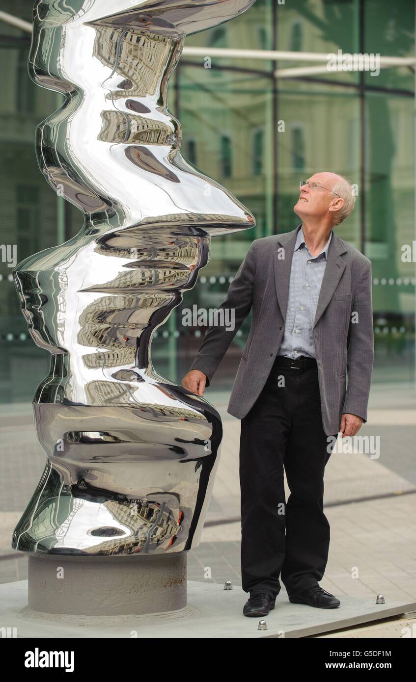 Sculptor Tony Cragg with his sculpture 'Elliptical Column 2012', part ...
