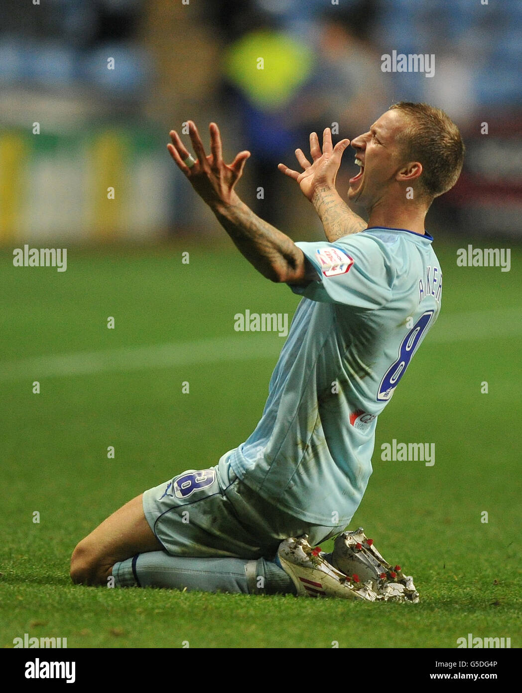 Coventry City's Carl Baker celebrates scoring his team's third goal ...