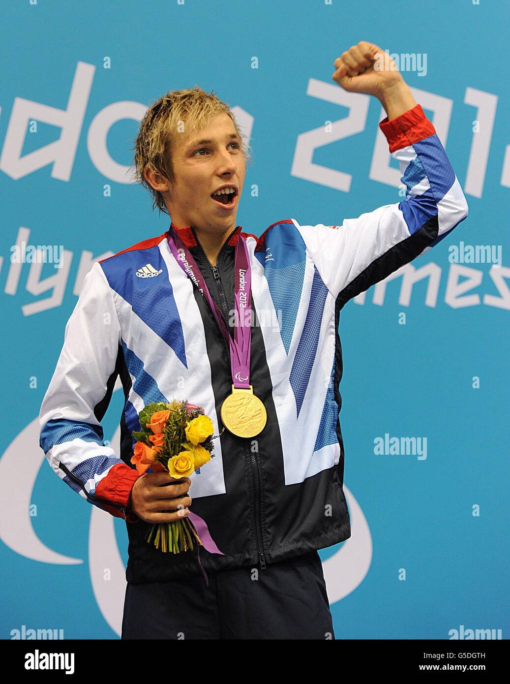 Great Britain's Jonathan Fox celebrates before receiving his gold medal ...