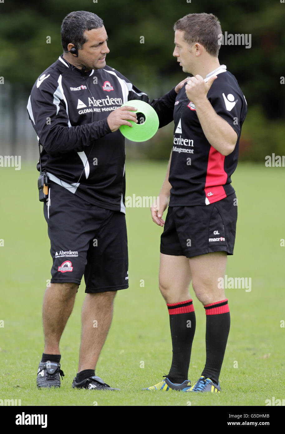 Edinburgh Rugby's head coach coach Michael Bradley (left) instructs ...