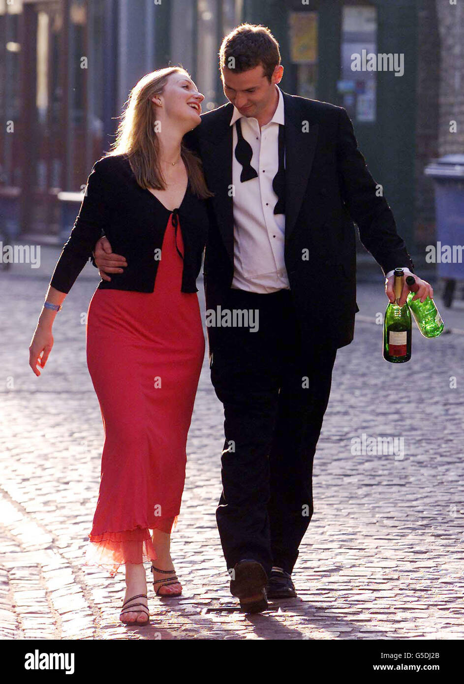 Students Claire Moffat and Nick Corcoran, both aged 26, head home after ...