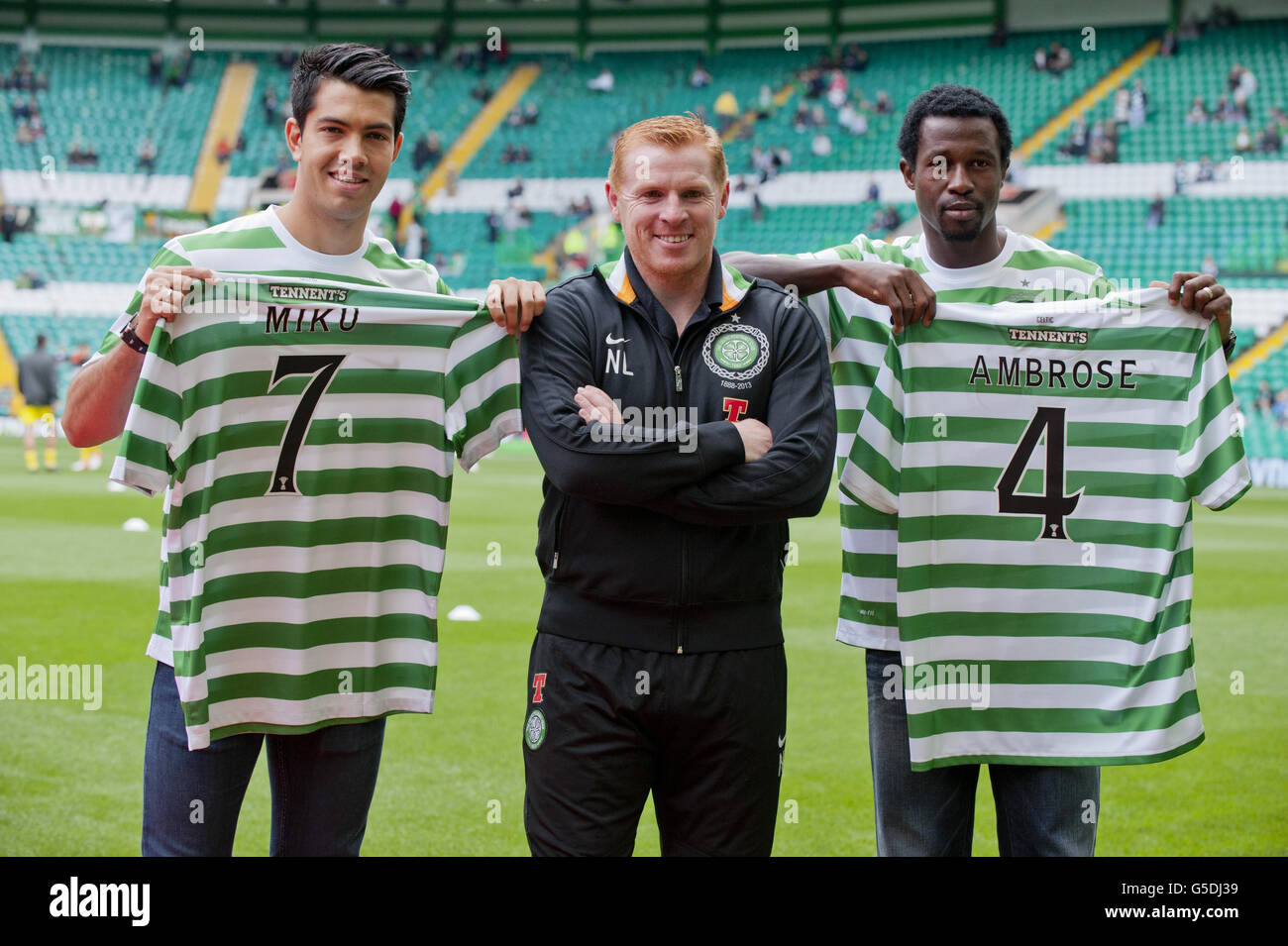 Celtic's new signings Nicolas Miku (left )and Efe Ambrose are unveiled ...