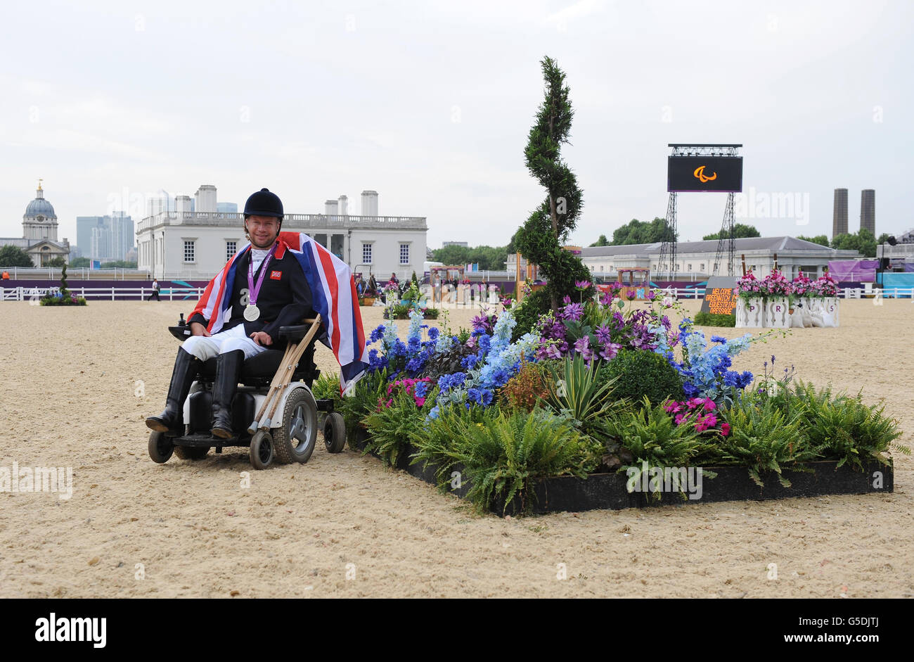 Great Britain's Lee Pearson with his silver medal after the Dressage ...