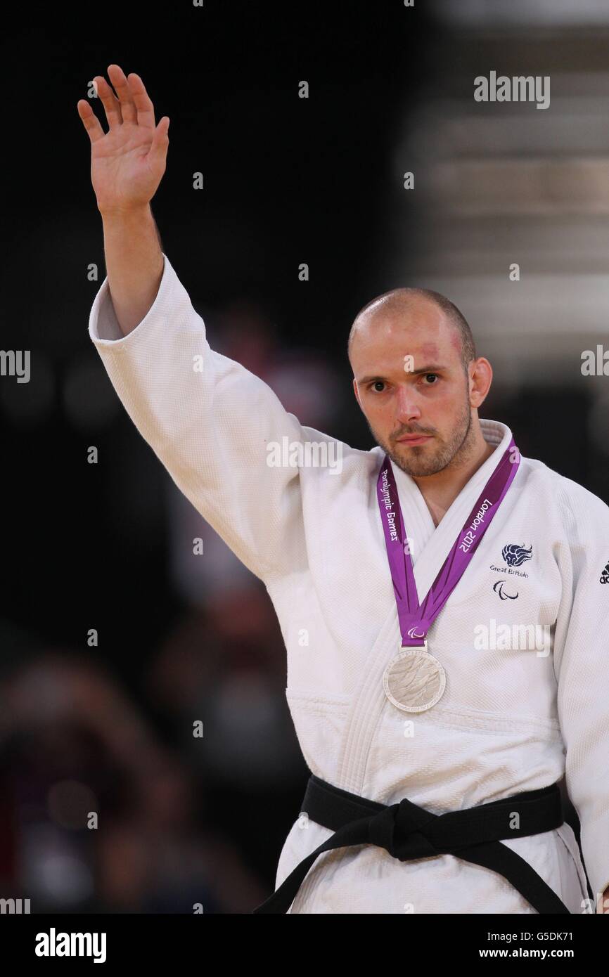 Great Britain's Samuel Ingram holds his silver medal after competing in ...