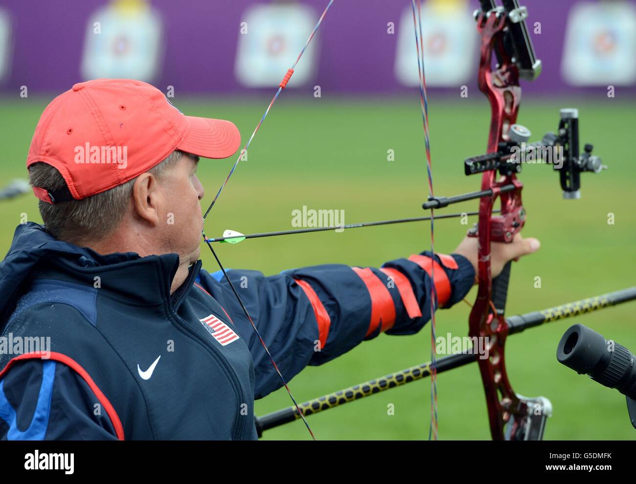 USA's Jeff Farby draws the bow with his teeth as he competes during the ...