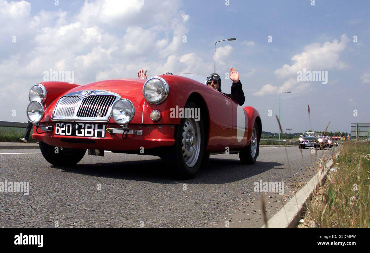 MG drivers form a convoy at Lola headquarters in Huntingdon, Wednesday ...