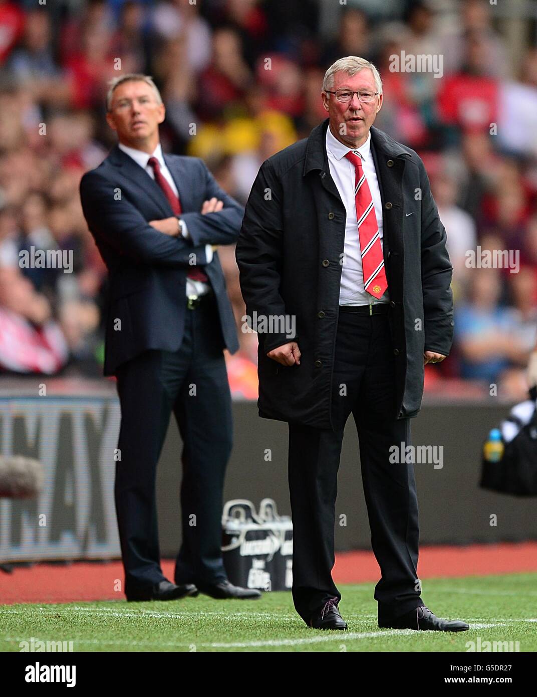 Manchester united manager sir alex ferguson right on the touchline hi ...