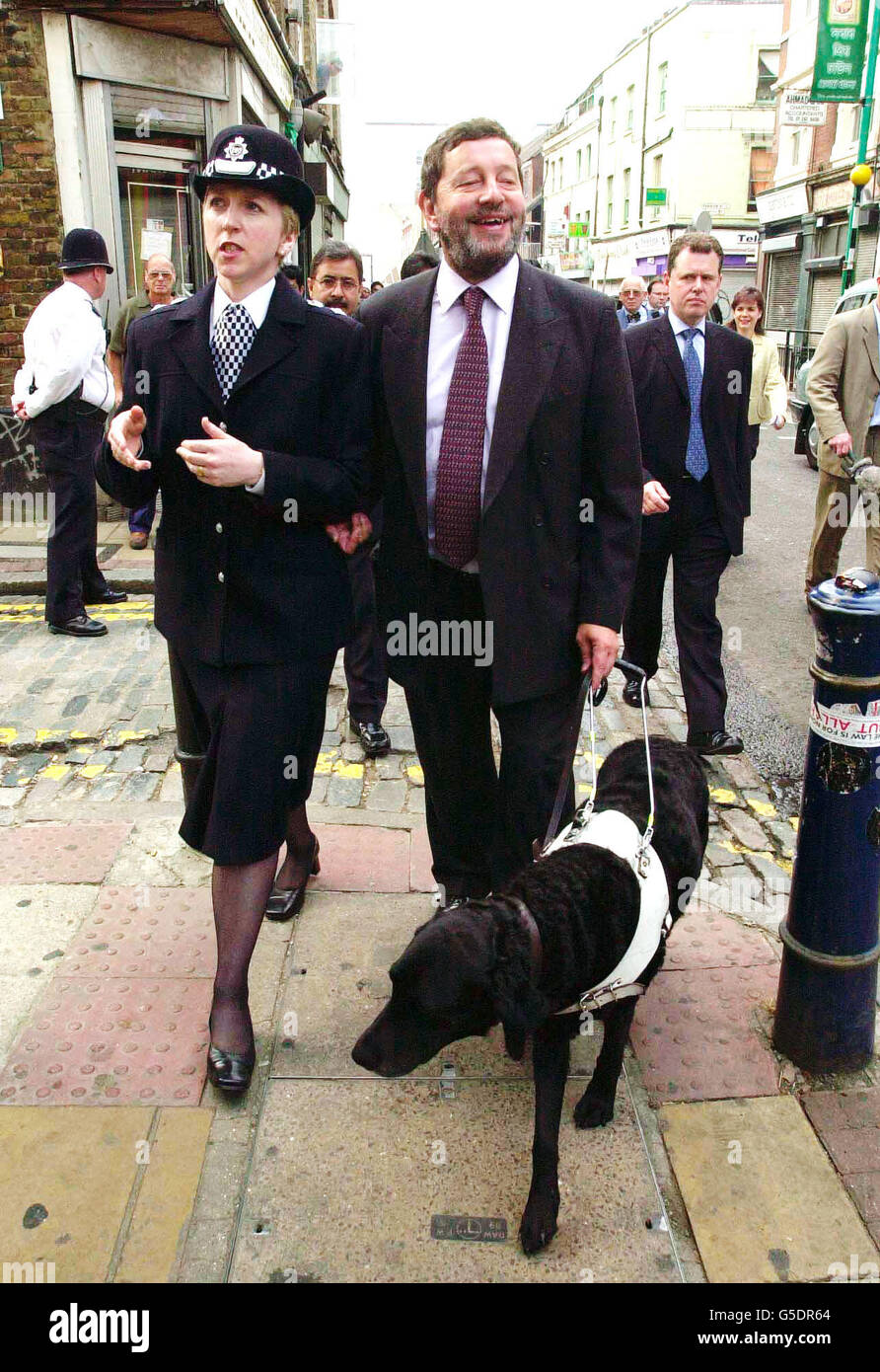 Aided by his guide dog hi-res stock photography and images - Alamy