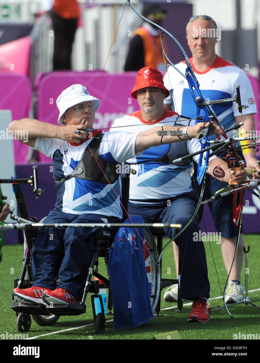 Great Britain's Paul Browne (left) competes with Phil Bottomley (centre ...