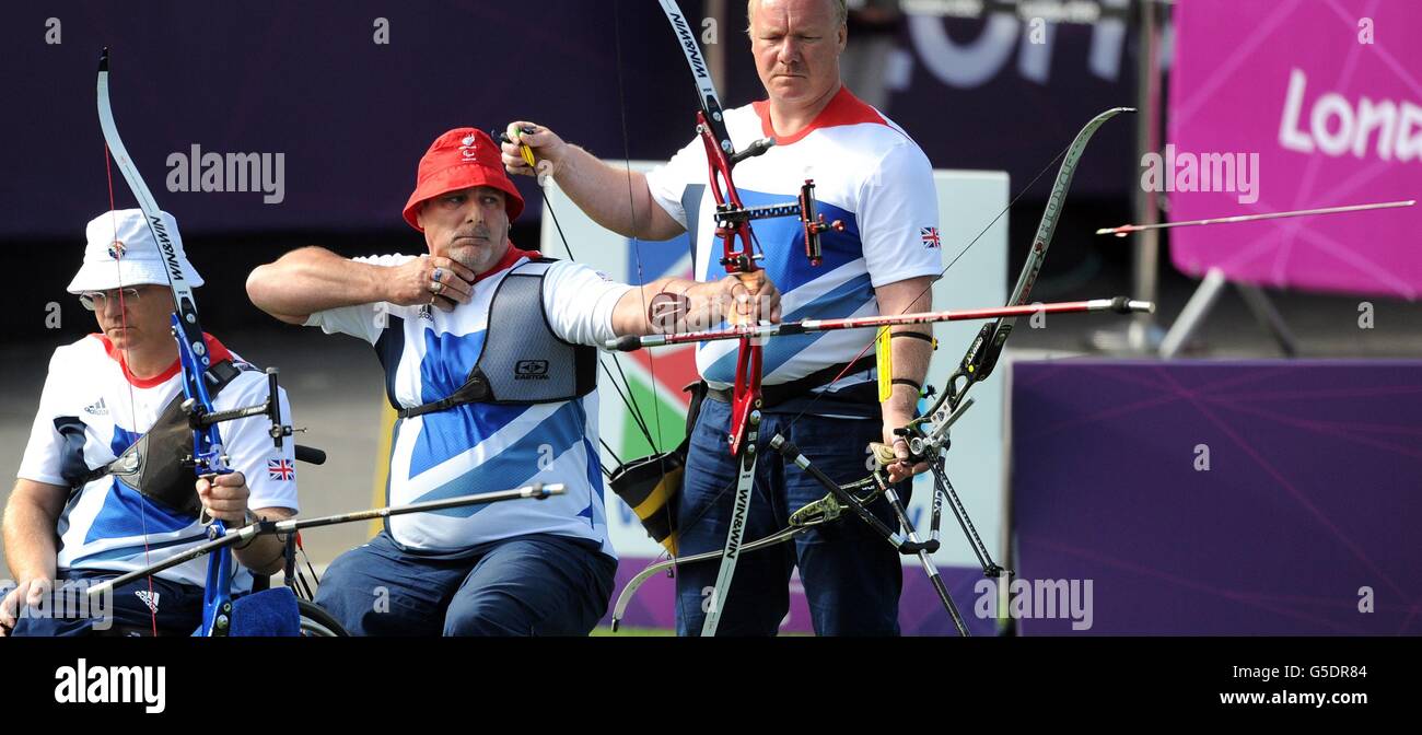 Great Britain's Phil Bottomley (centre) competes as Paul Browne (left ...