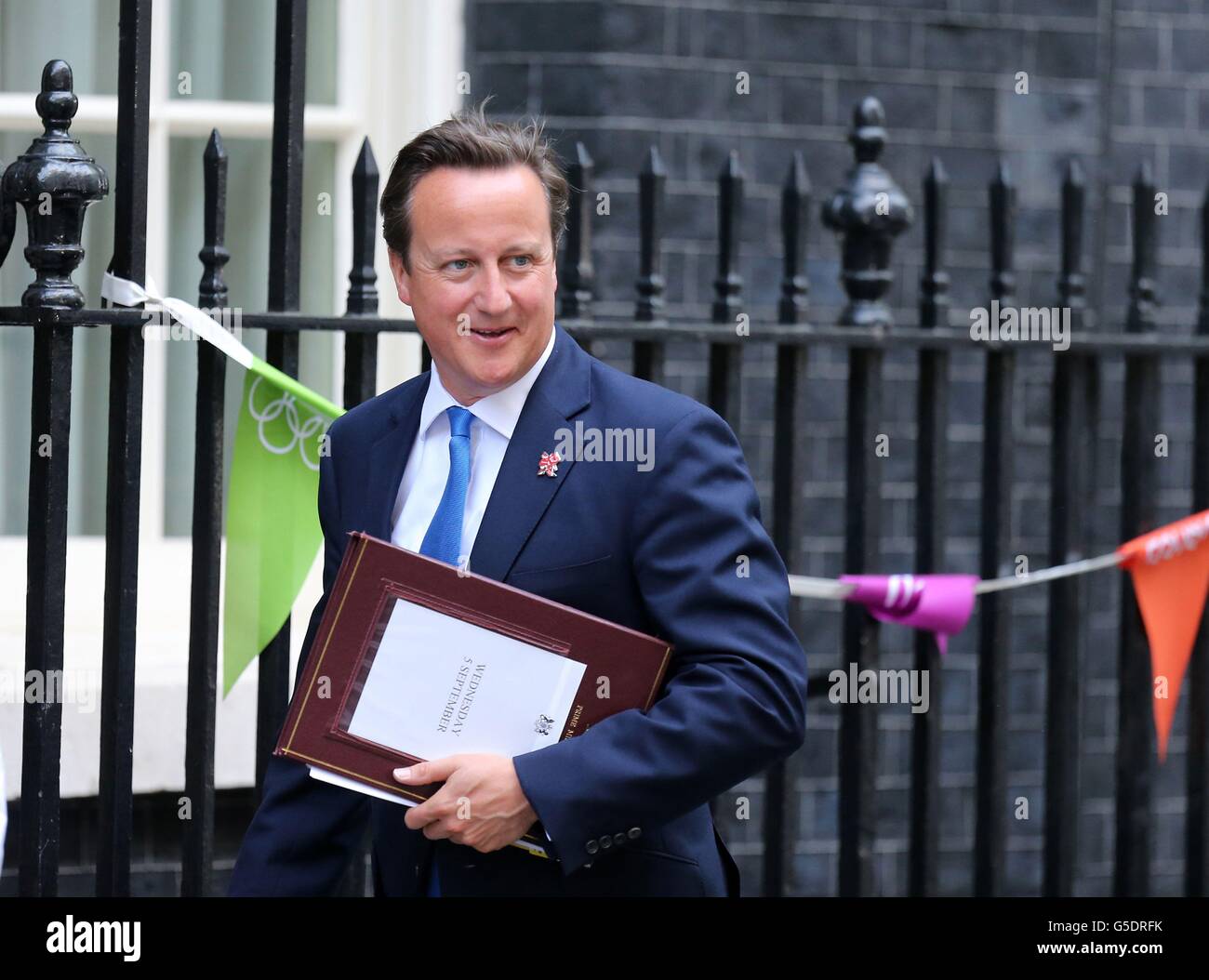 Prime Minister David Cameron arrives at Downing Street in London, after ...