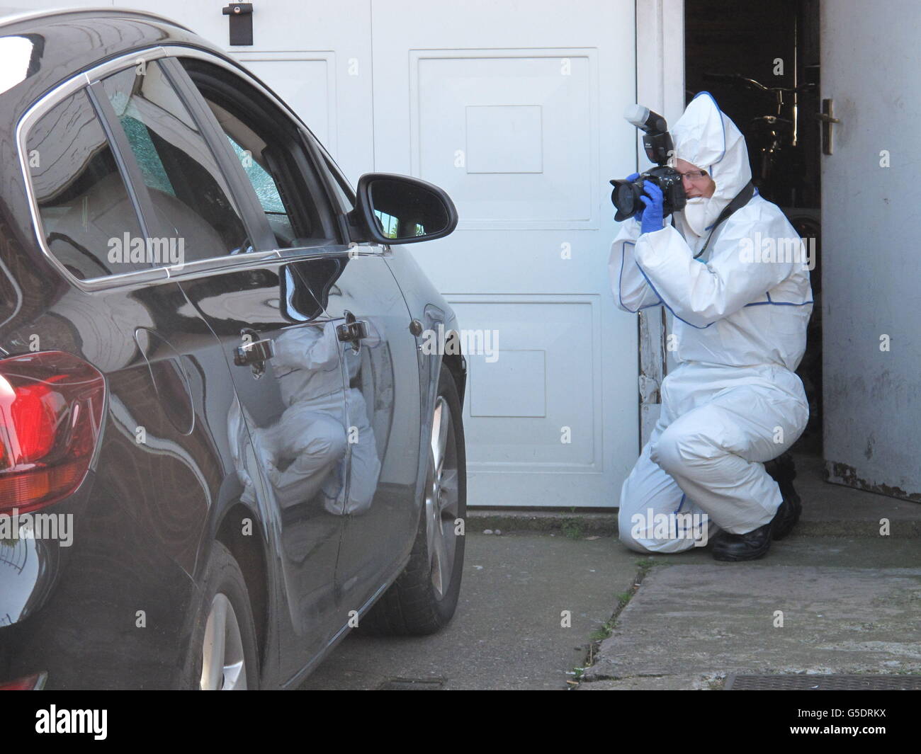 Police at a house in Arthur Road, Tipton, West Midlands, after a man ...