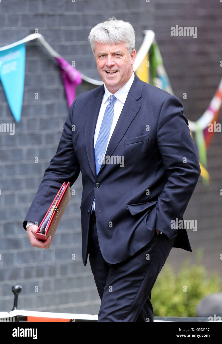 Leader of the Commons Andrew Lansley arrives for a cabinet meeting at ...