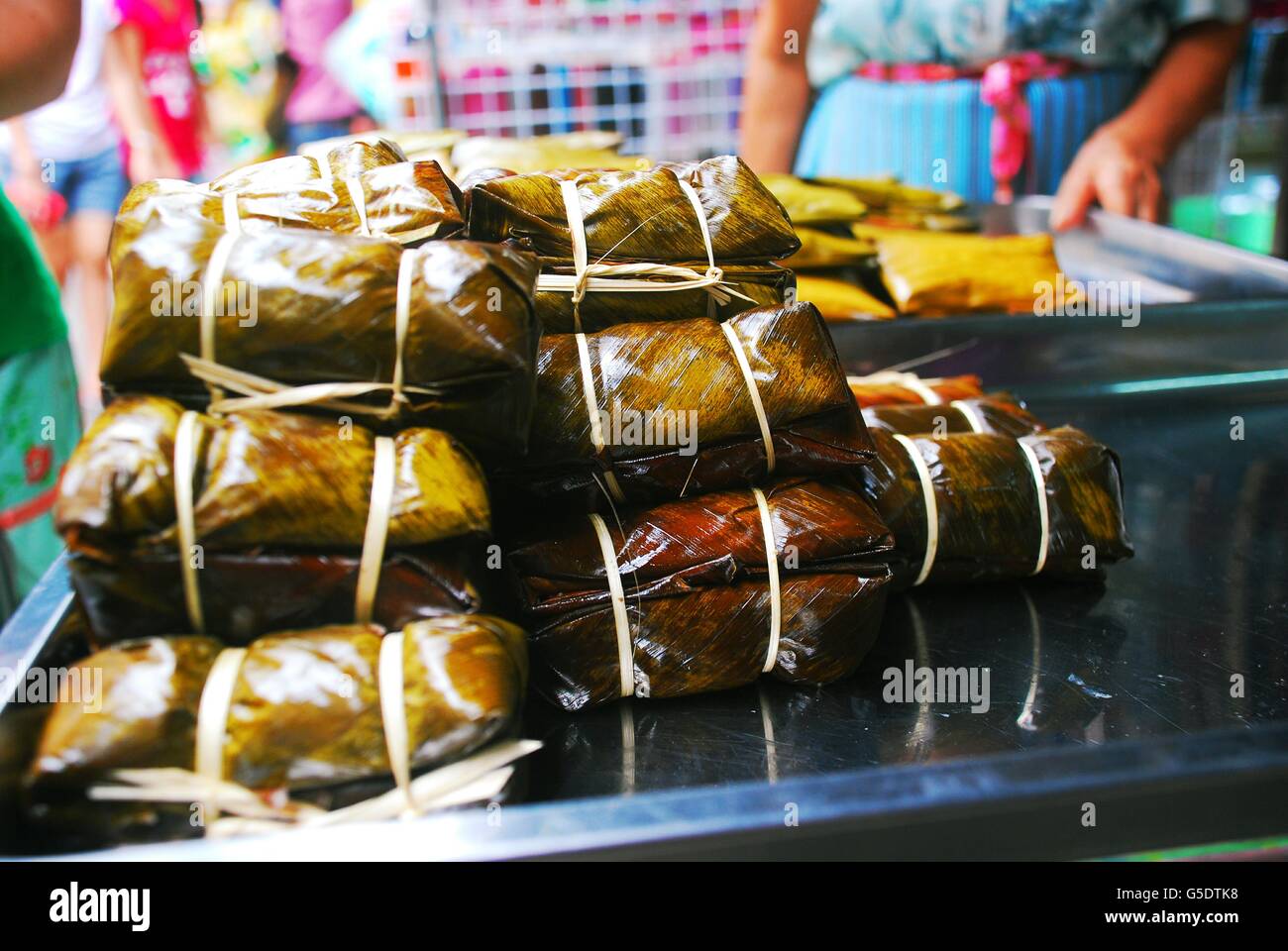 Steamed sweet sticky rice in banana leaves, Bangkok, Thailand Stock ...