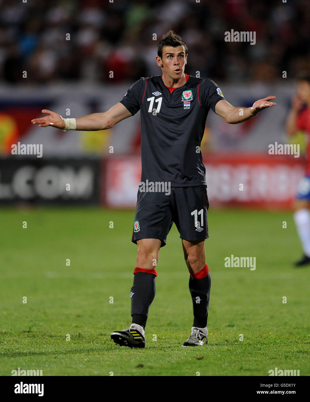 Wales' Gareth Bale gestures to a team mate during the 2014 FIFA World ...