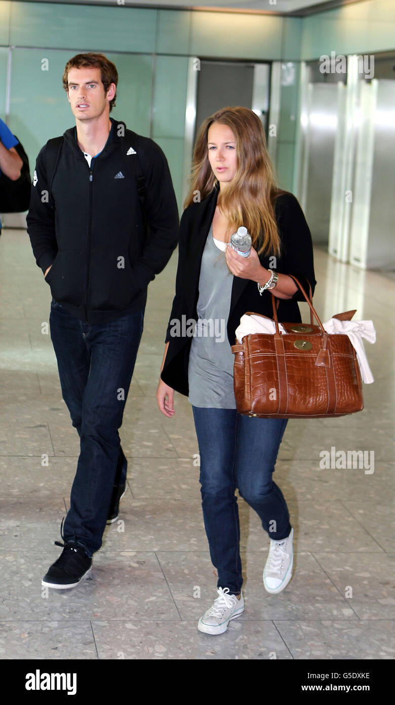 US Open winner Andy Murray and his girlfriend Kim Sears arrive back at ...