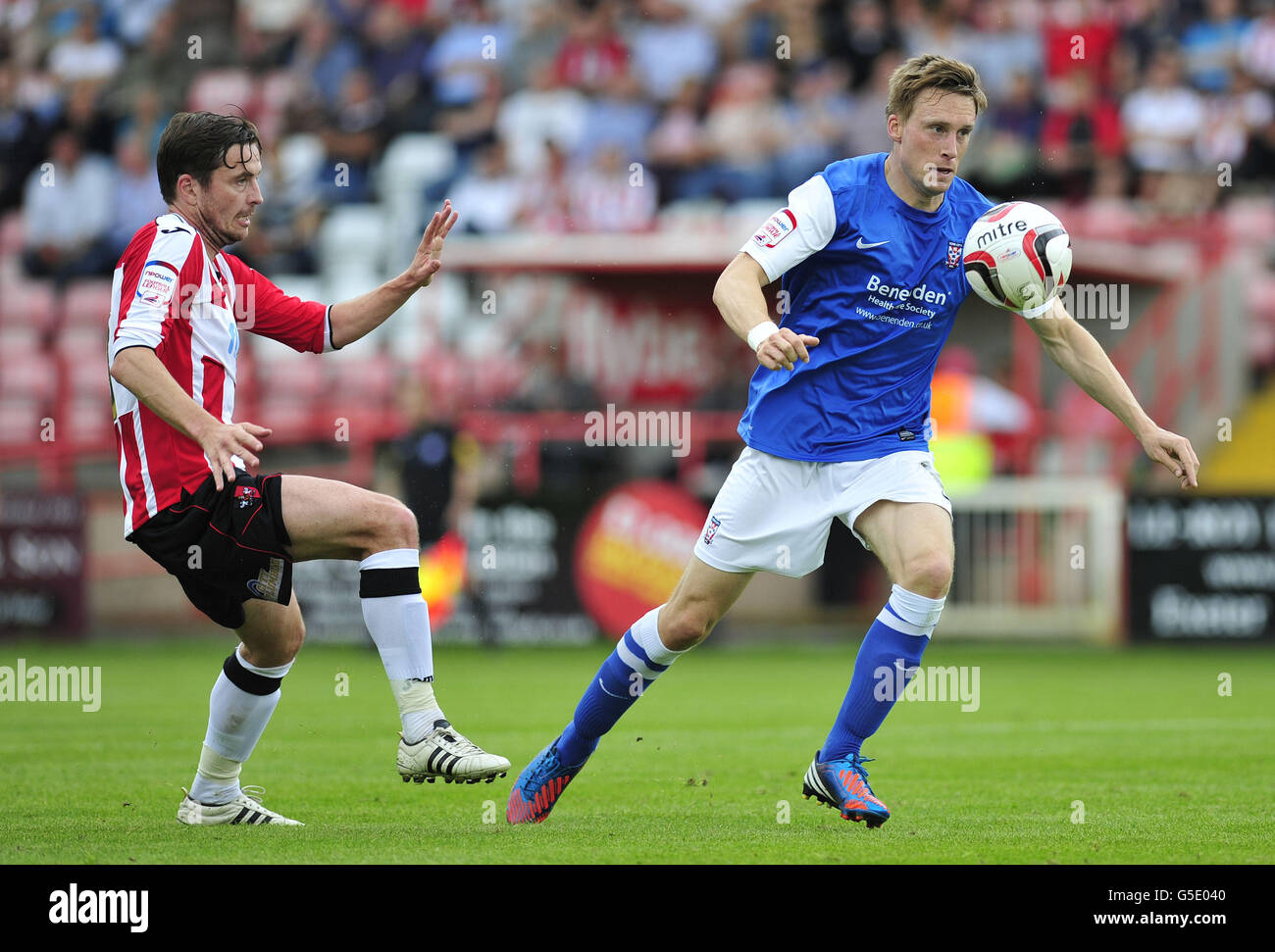 Exeter City's Matt Oakley and York City's Daniel Parslow (right) battle ...