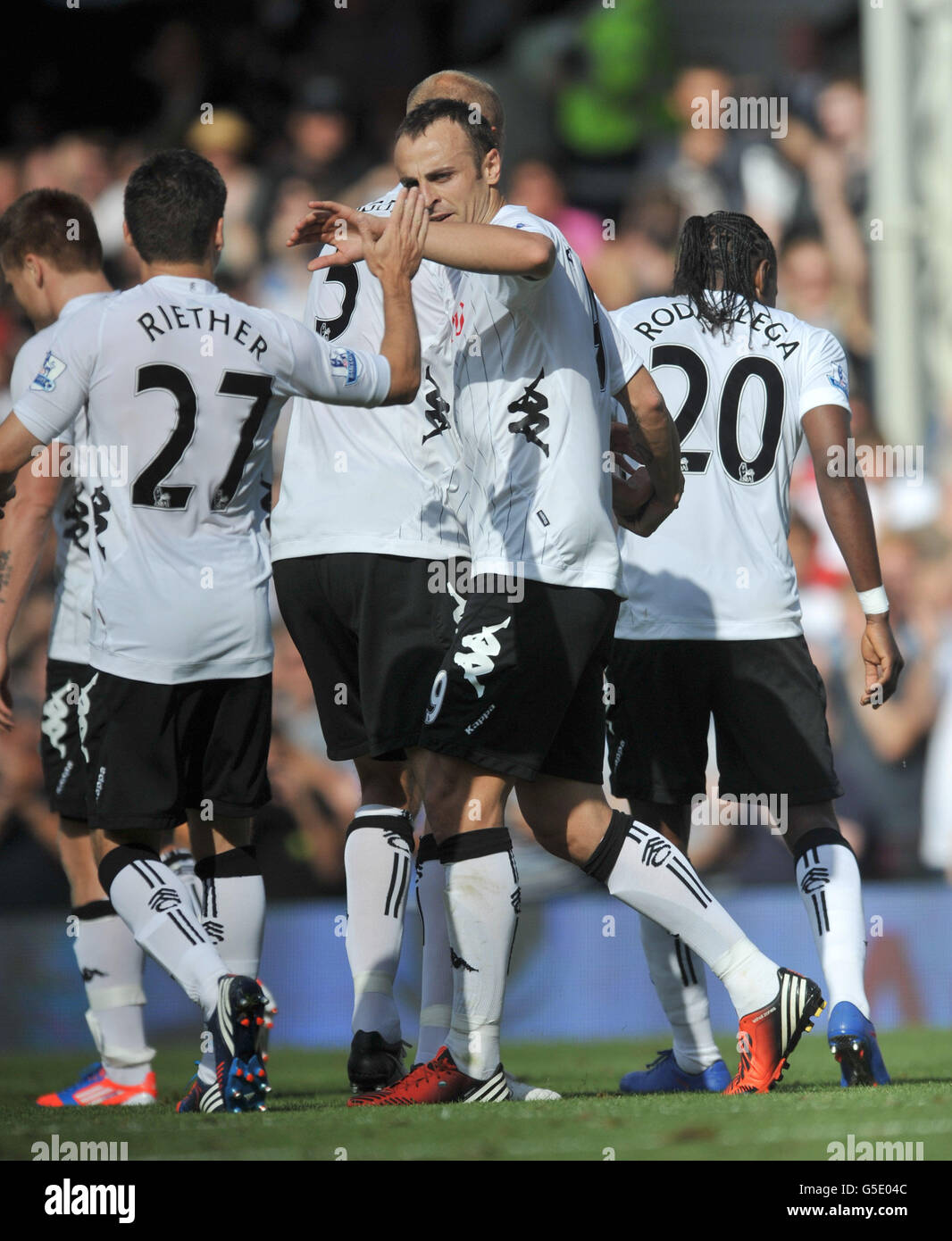 Fulham's Dimitar Berbatov celebrates scoring his sides second goal ...