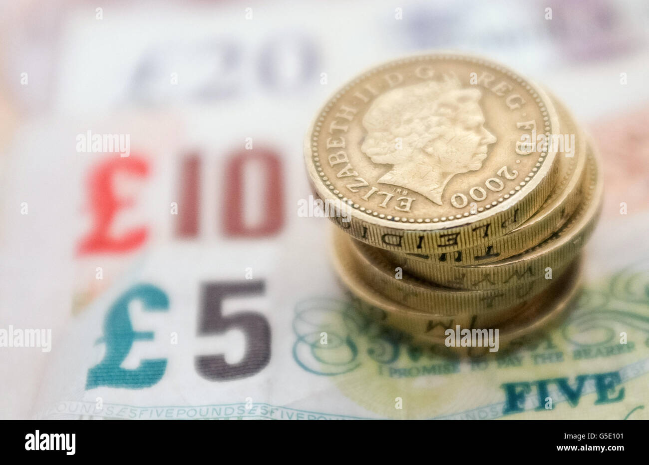 A general view of some UK pound coins and banknotes, as inflation edged ...