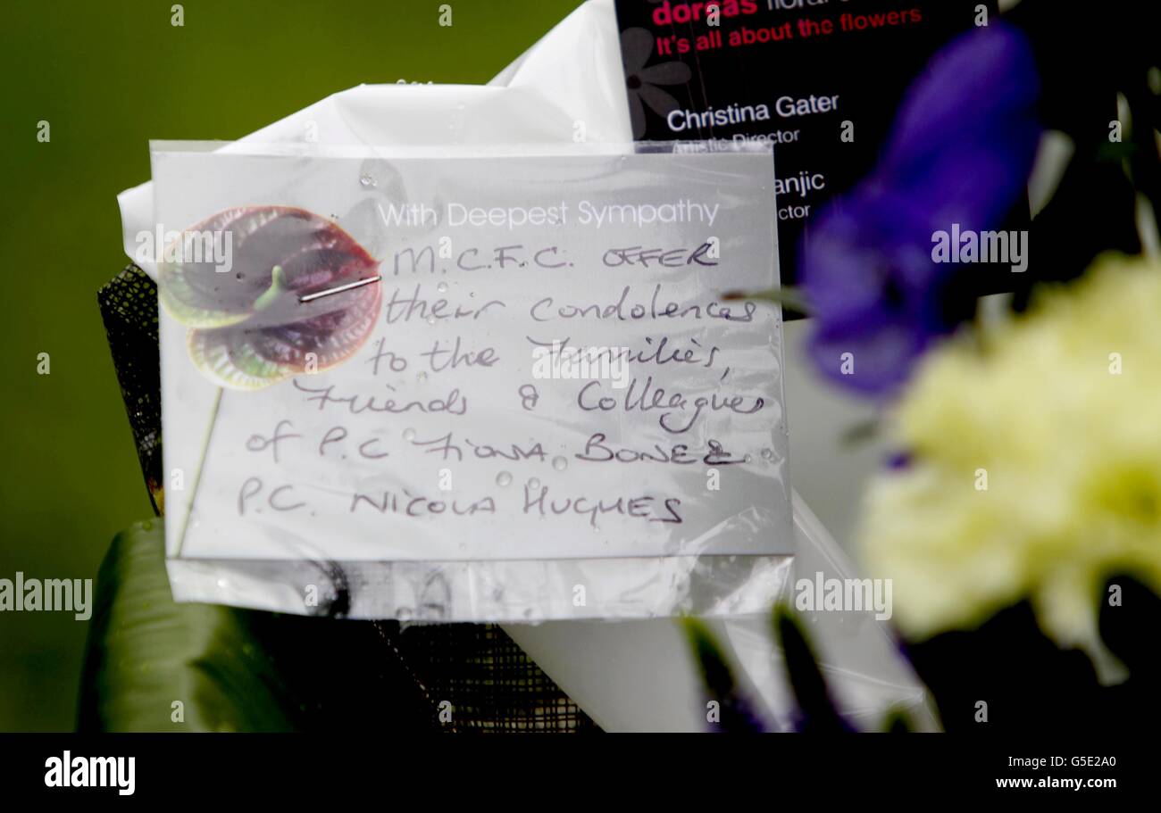 Floral tributes at the scene where police constables Fiona Bone, 32 ...