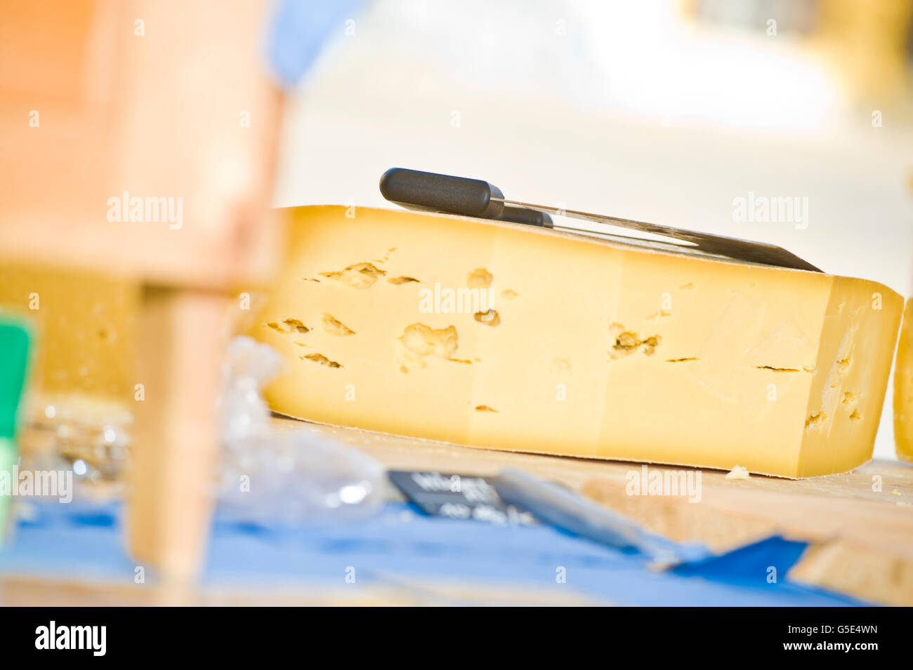 Wheel of cheese, cut Stock Photo - Alamy