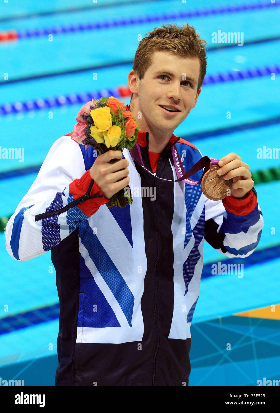 Great Britain's James Clegg poses with his Bronze Medal following the ...