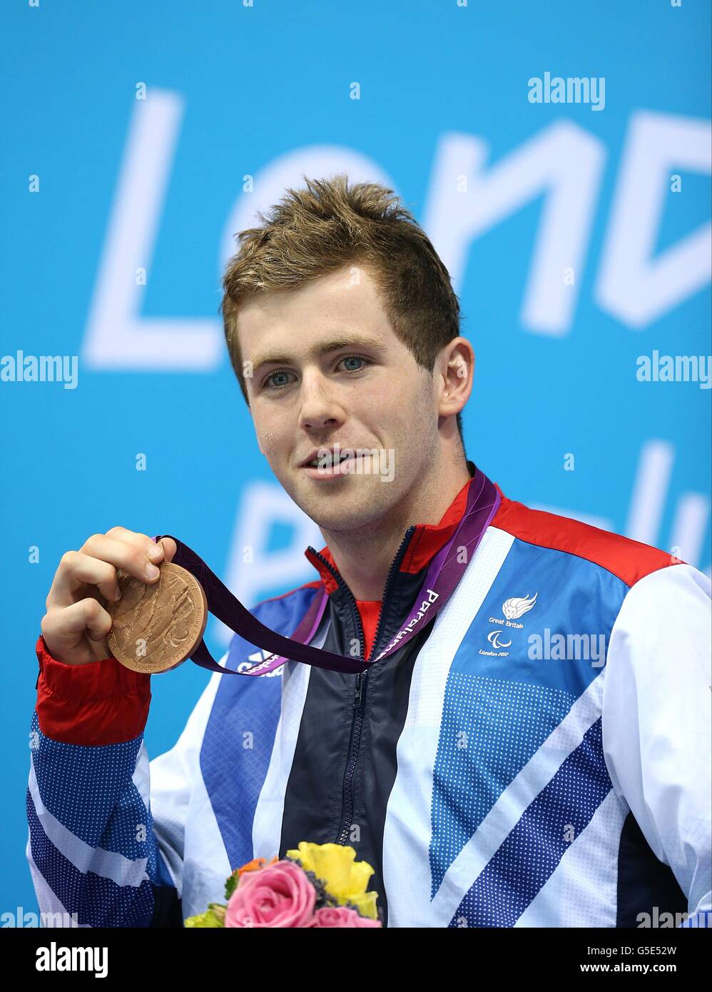 Great Britain's James Clegg on the podium with his the bronze medal for ...