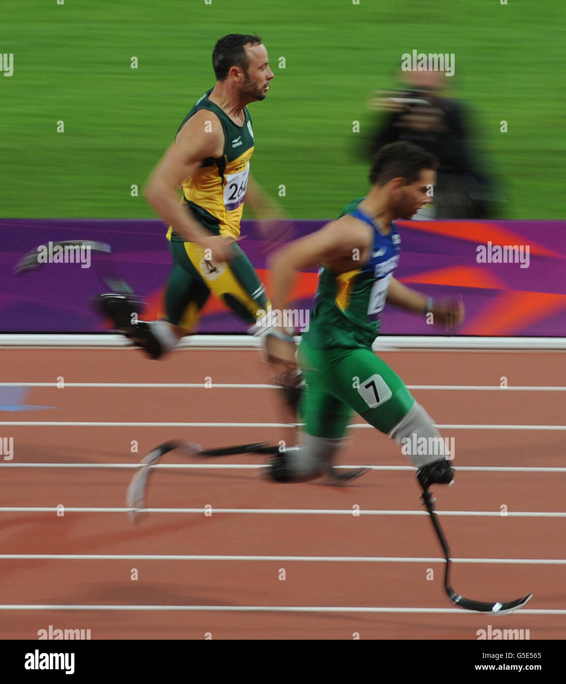 South Africa's Oscar Pistorius is overtaken by Brazil's Alan Fonteles ...