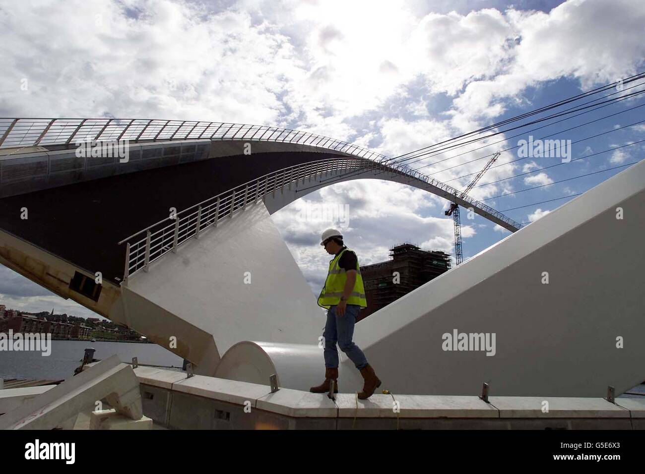 An workman checks out the newly opened Millennium Eye Bridge in ...