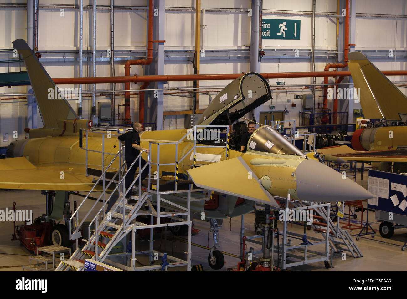 An employee works on a Eurofighter Typhoon at BAE Systems, Warton ...