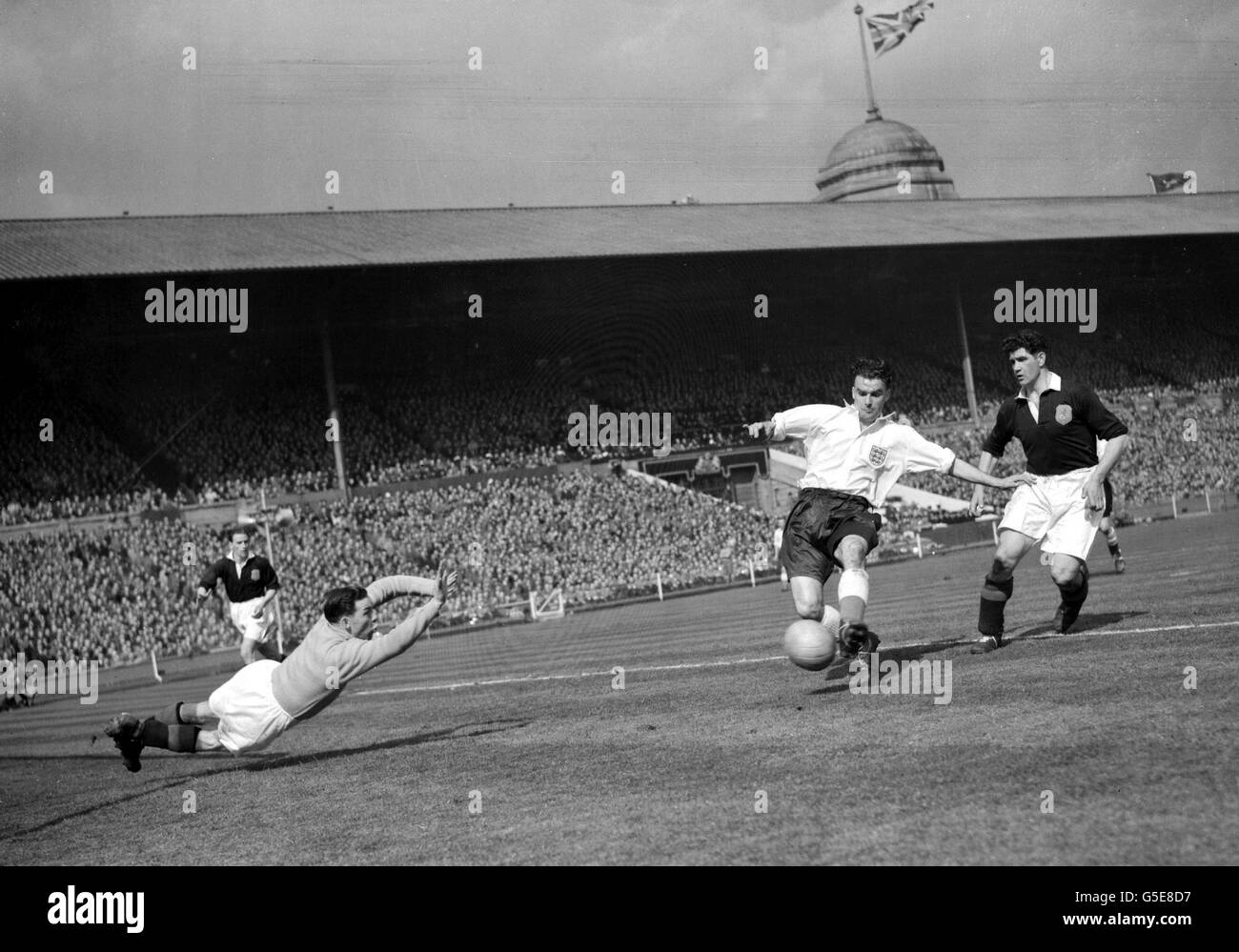 Scotland's goalkeeper Cowan makes a save from England and Manchester ...