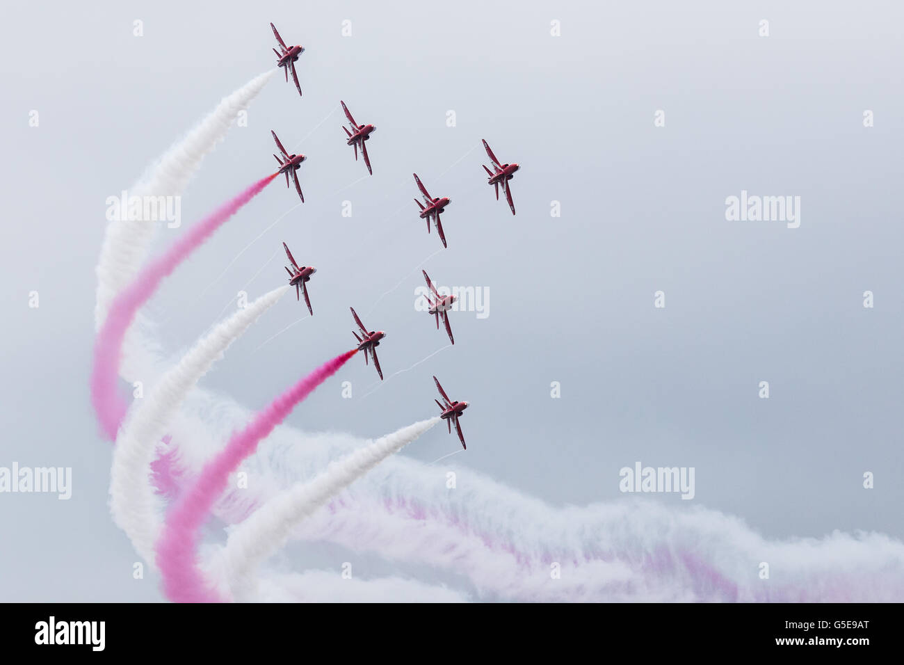 Red Arrows trailing red and white smoke in their Typhoon formation ...