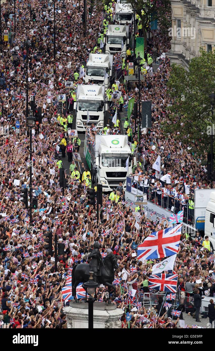 The crowd in Trafalgar Square cheer the floats passing by, during a ...