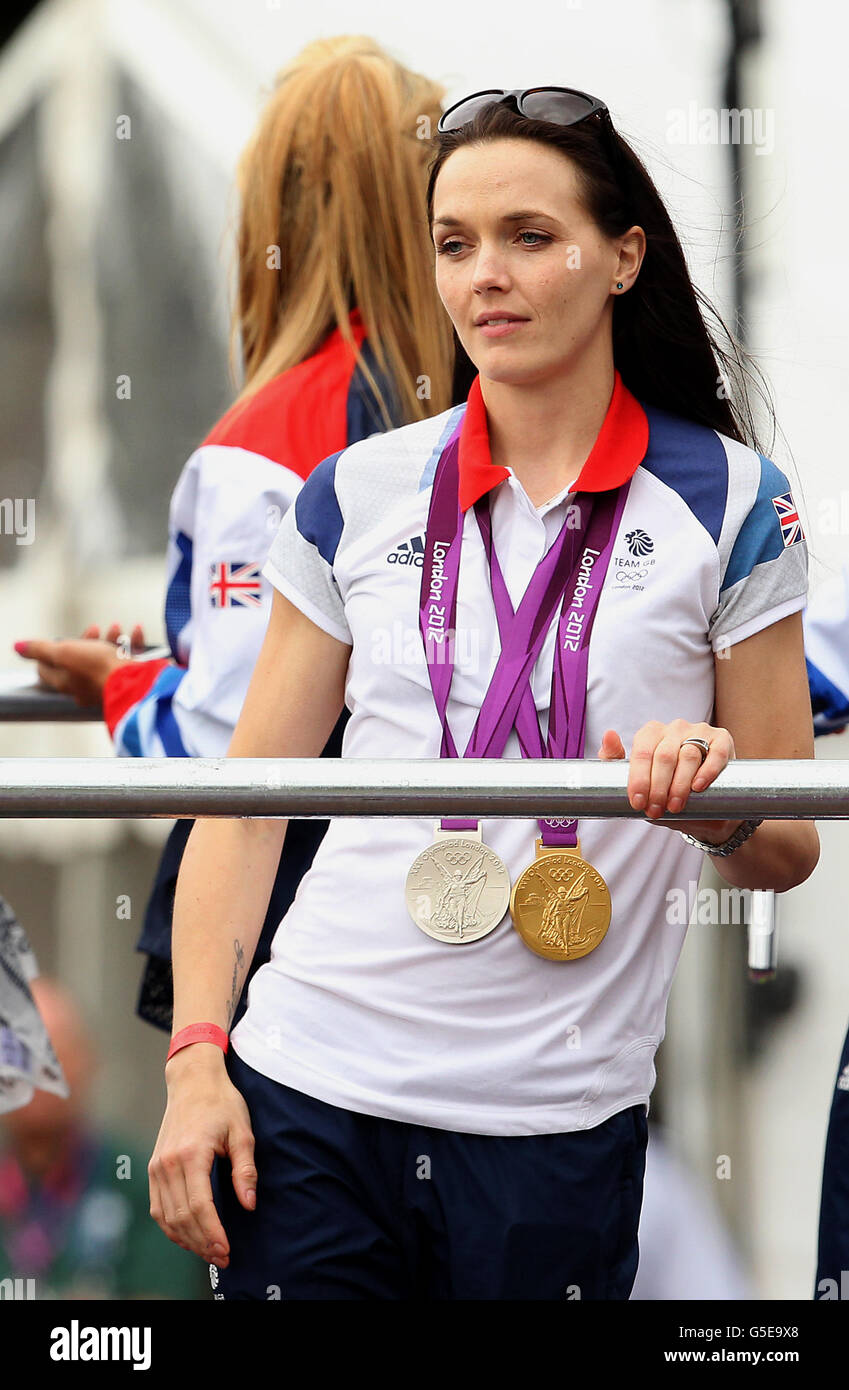 Cyclist Victoria Pendleton takes part in a parade through London ...