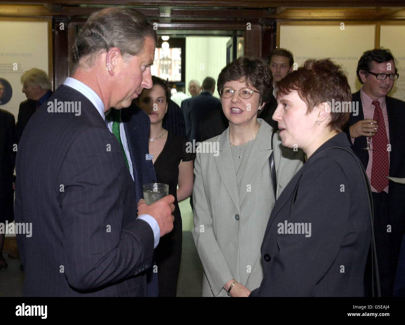 The Prince of Wales talks to librarians Nicola Barnett (R), from ...
