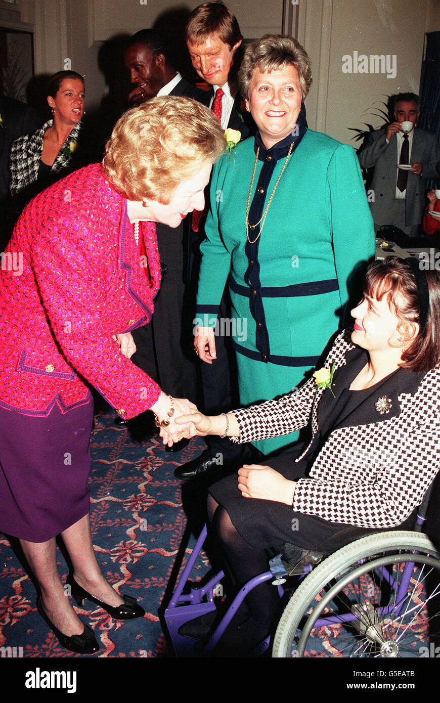 Baroness Thatcher chats with three of the nominees for the 1992 People ...