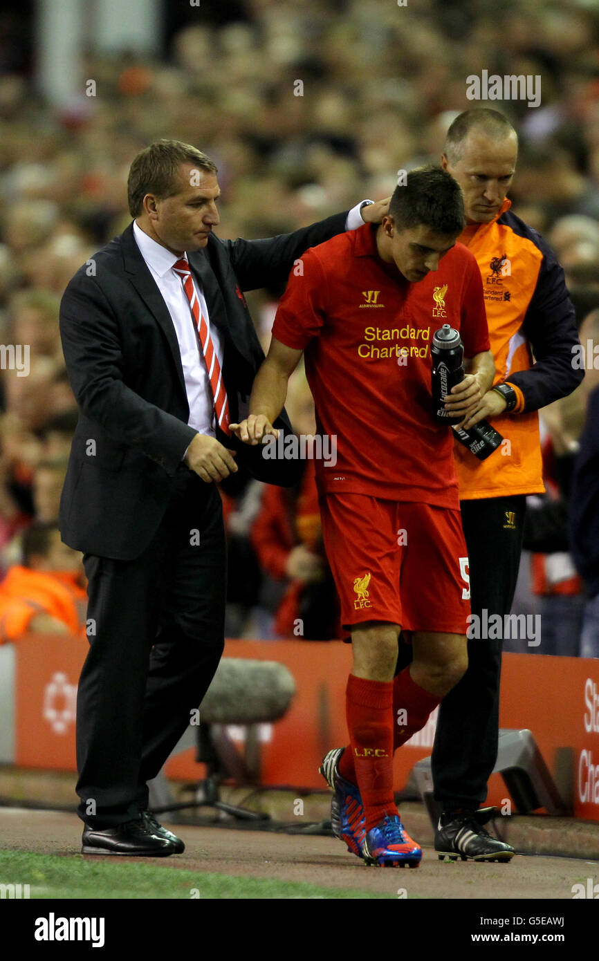 Liverpool manager Brendan Rodgers (left) with Adam Morgan (right Stock ...