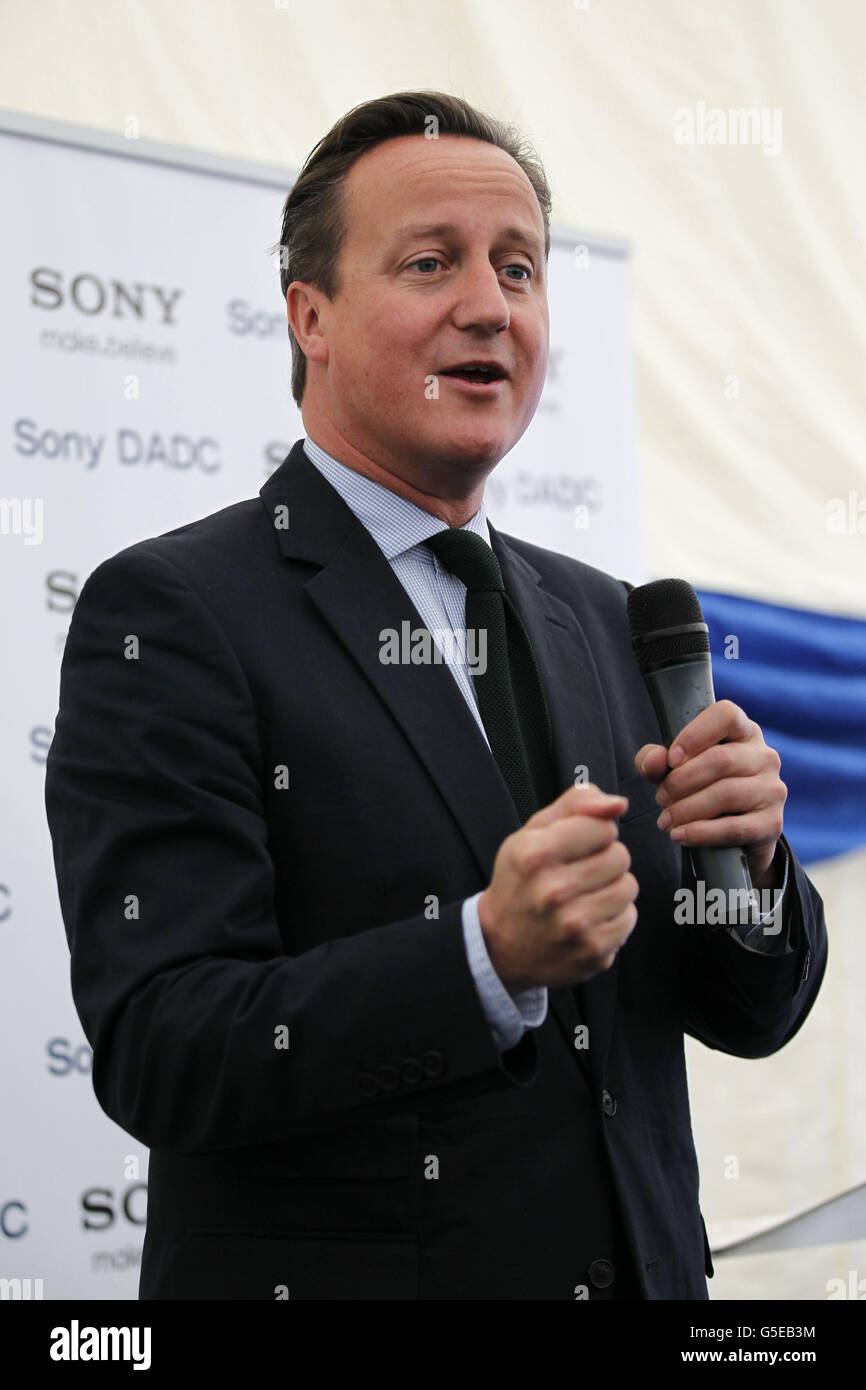 Prime Minister David Cameron addresses staff members as he opens the ...