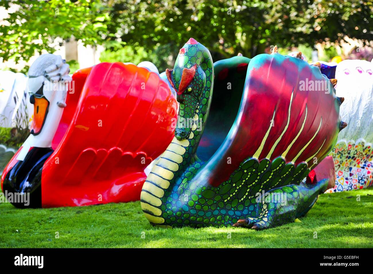 A view of a dinosaur themed sculpture called 'The Swanster ...