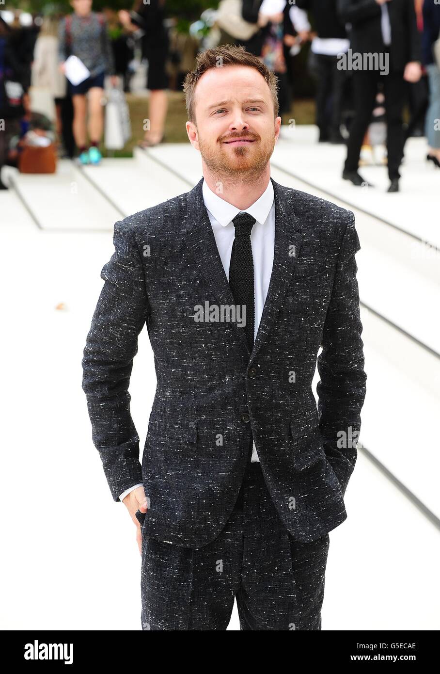 Aaron Paul arriving for the show at Kensington Gardens Stock Photo - Alamy
