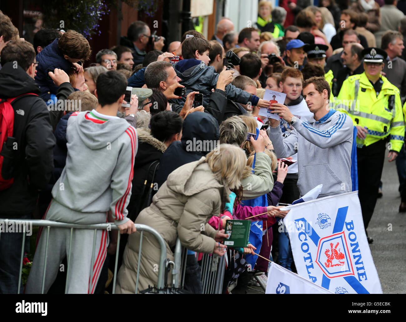 Andy Murray signs autographs during a walkabout in Dunblane after he ...