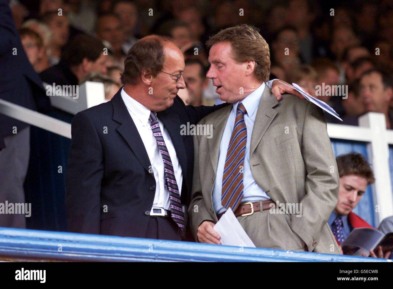 Former West Ham United's manager Harry Redknapp (right) is welcomed to ...