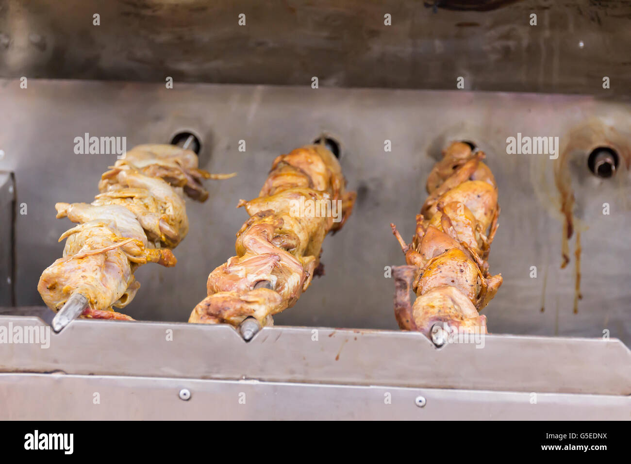 Barbecued suckling partridge roasted on fire Stock Photo - Alamy