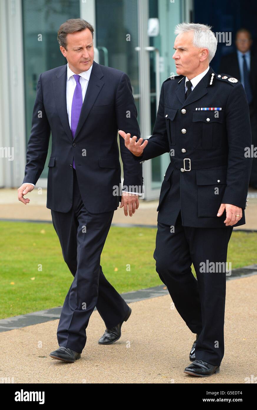 Prime Minister David Cameron (left) speaks with Chief Constable of ...