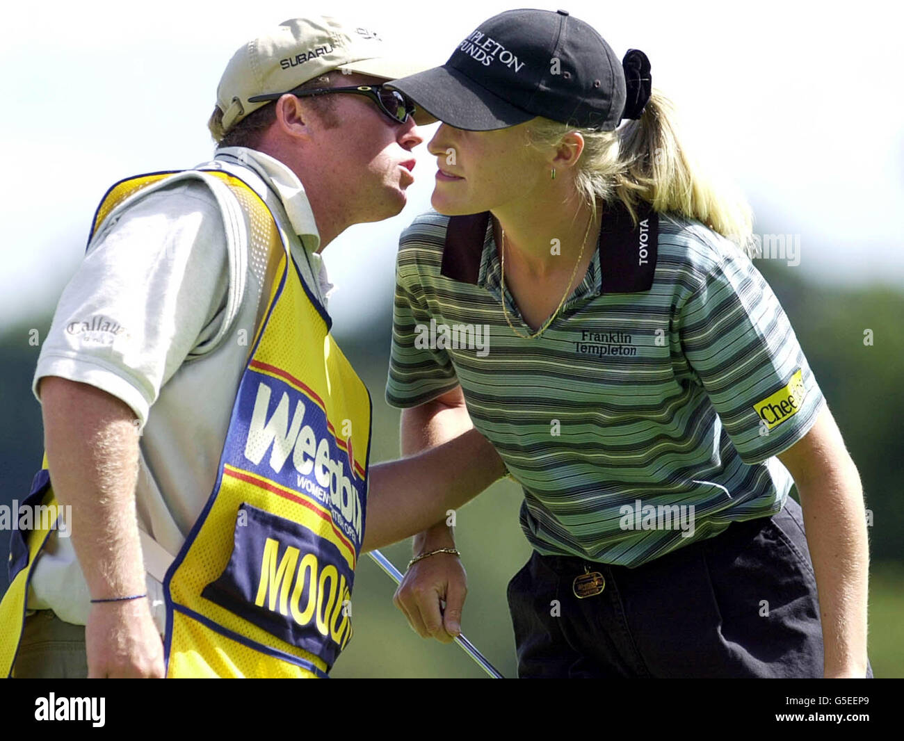Scotland's Janice Moodie receives a consolation kiss from her caddie on ...