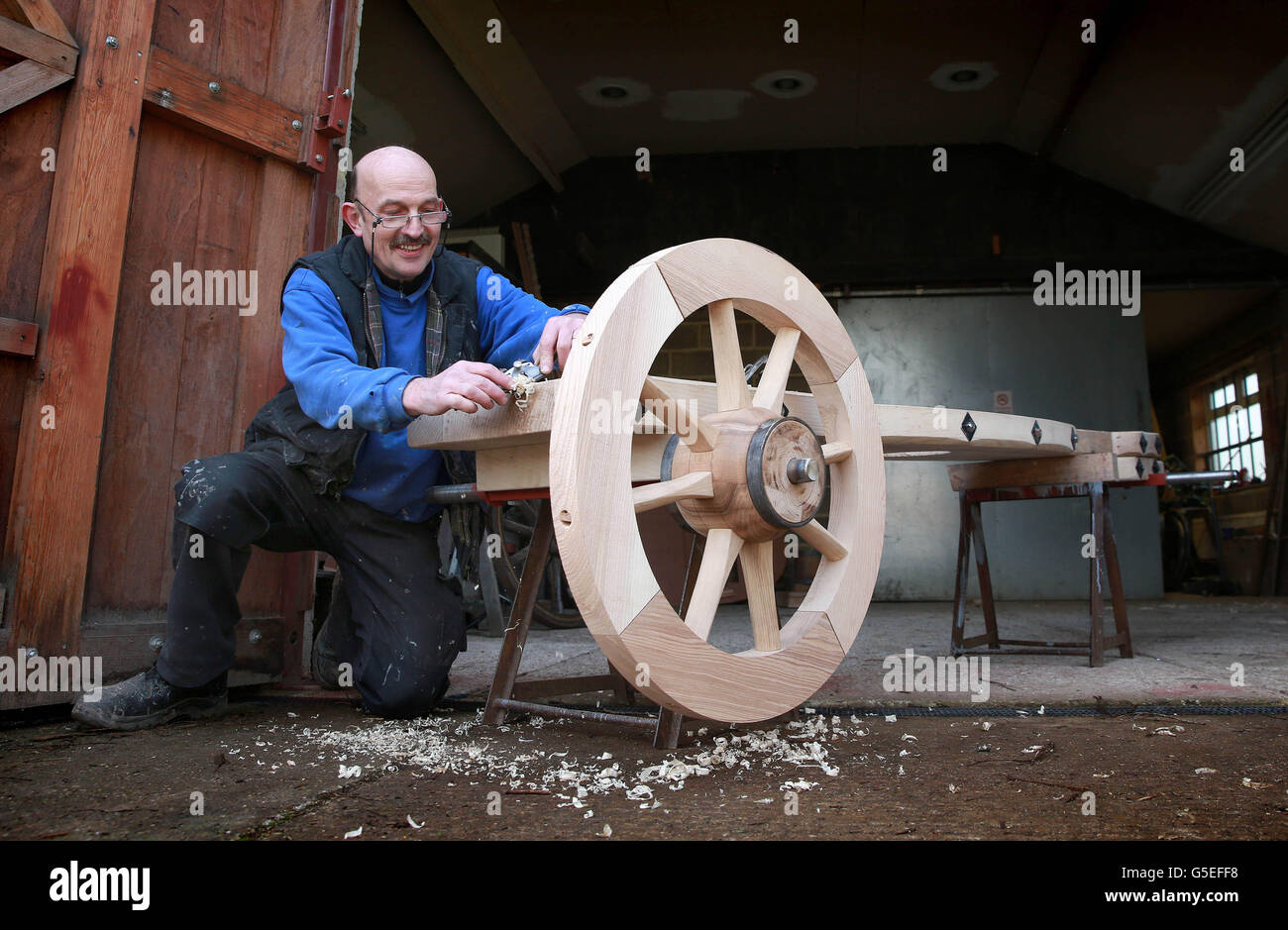 EDITORIAL USE ONLY Tim Brisley constructs a wheel as part of the ...