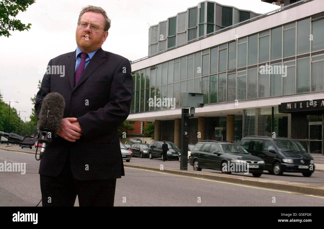 Transport minister John Spellar beside a speed camera in London, after ...