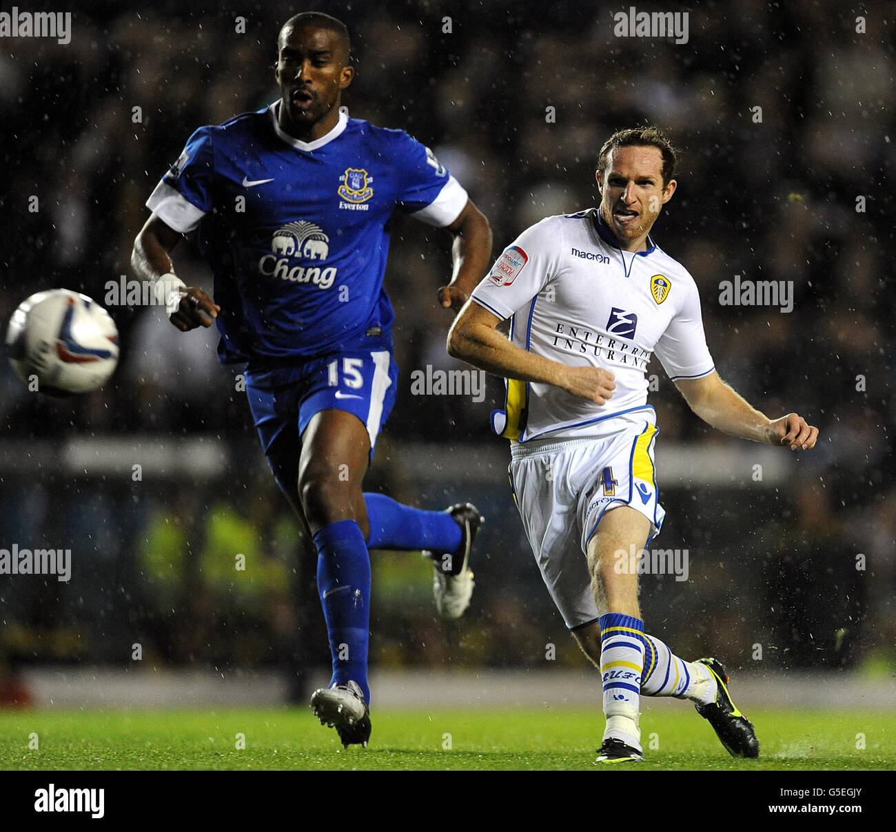 Leeds United's Aidan White (right) scores his side's first goal of the ...