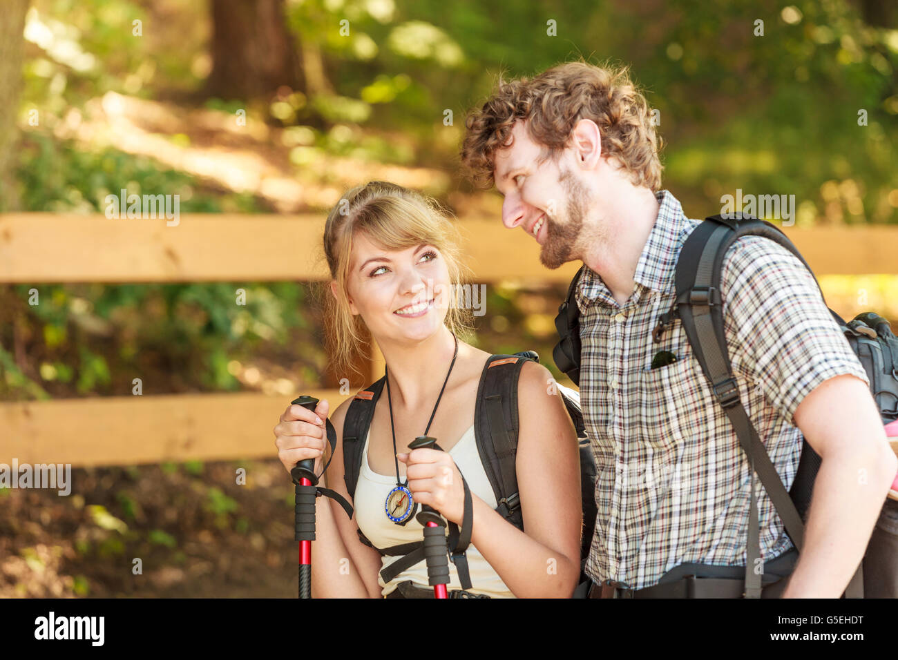Adventure, tourism, enjoying summer time. Hiking young couple with ...